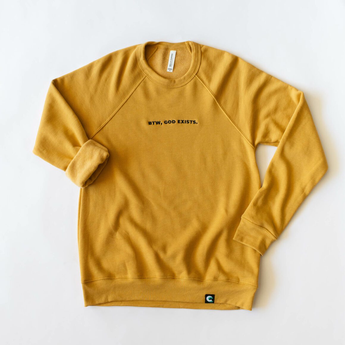 Btw, God Exists | Mustard Sweater - Capturing Christianity